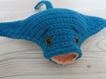 Blue manta ray crochet toy